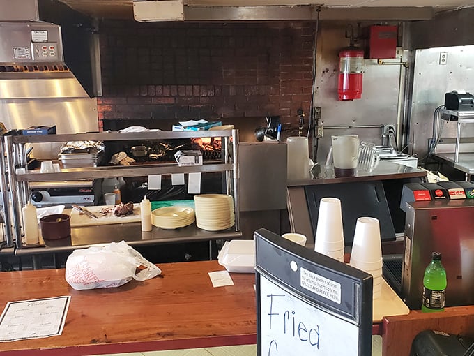 Behind the scenes where smoke and patience transform ordinary meat into extraordinary barbecue—no shortcuts, just tradition.