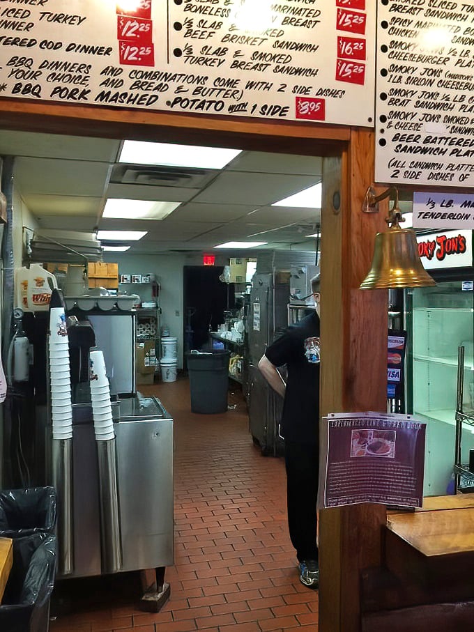 Behind the scenes where smoke meets meat – the kitchen view reveals the organized chaos of barbecue perfection.