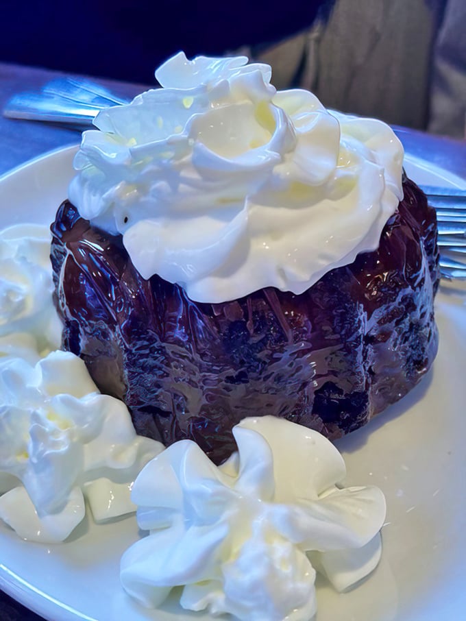 Chocolate lava cake with whipped cream—because after conquering the ocean's bounty, you deserve a little volcanic action for dessert.