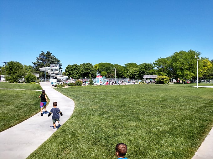 Children racing toward summer joy—the universal language of "last one in is a rotten egg!" Lexington's aquatic center delivers memories by the gallon.