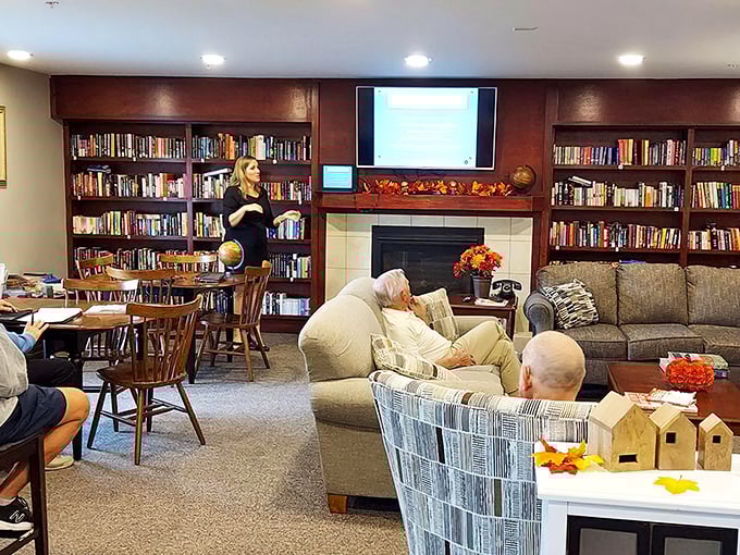 The community library offers both books and conversation—perfect for those who believe reading is a social sport best enjoyed with fellow enthusiasts.