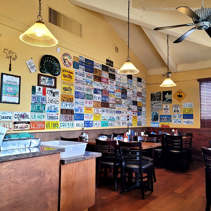 A wall of license plates tells stories of travels near and far – each one a conversation starter over coffee refills.