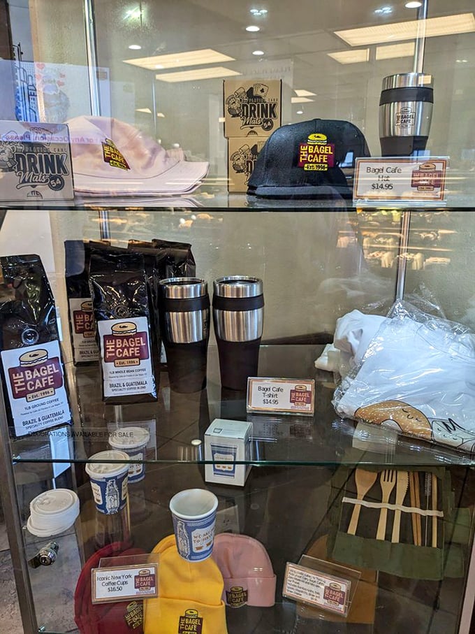 The merchandise display offers branded souvenirs—because sometimes you need a coffee mug to remember that life-changing pastrami.