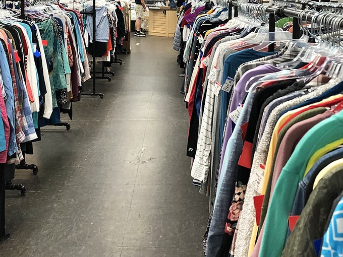The technicolor dream aisle. Every hanger holds potential—that perfect silk blouse or vintage Hawaiian shirt might be hiding in plain sight.