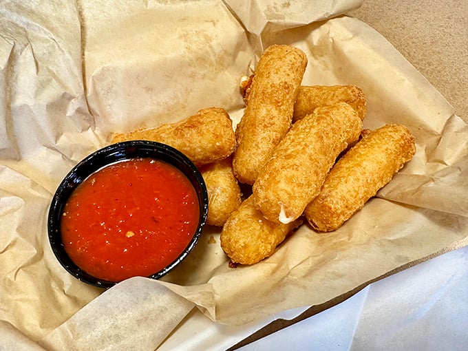 Mozzarella sticks: the comfort food equivalent of a warm hug, with marinara sauce standing by for that perfect tangy counterpoint.