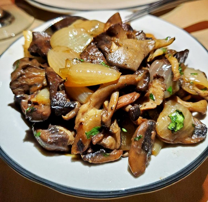 These mushrooms and onions have been caramelized to the edge of surrender, creating a side dish that threatens to upstage your main course.