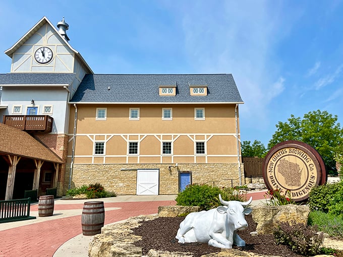 New Glarus Brewing Company's impressive facility features a white cow statue that seems to say, "Yes, this is where the famous Spotted Cow beer comes from."