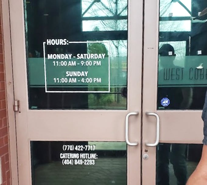 Hours posted clearly because they understand the emergency nature of sudden fried chicken cravings. Plan your week accordingly.