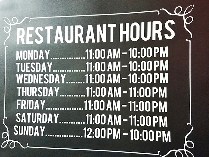 Hours posted with the confidence of a place that knows exactly when you'll need your pizza fix – which is pretty much always.