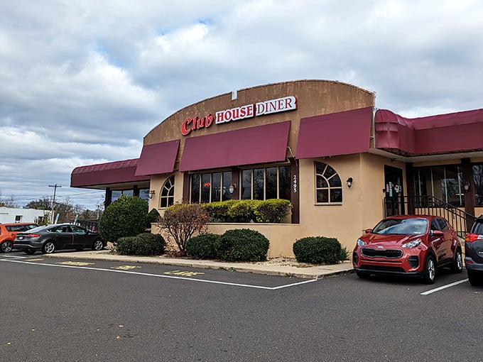 From another angle, the Club House Diner's distinctive architecture stands out in the suburban landscape—a temple of comfort food with plenty of parking.