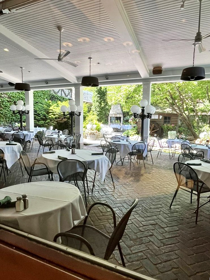 The outdoor patio—where summer evenings stretch into perfect memories, and the Minnesota air somehow makes everything taste even better.