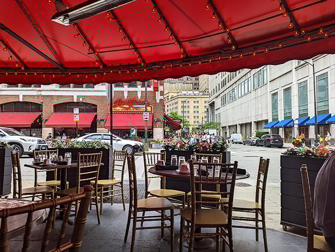 The covered patio offers front-row seats to the Rush Street theater, where Chicago's urban drama unfolds while you twirl pasta in blissful detachment.