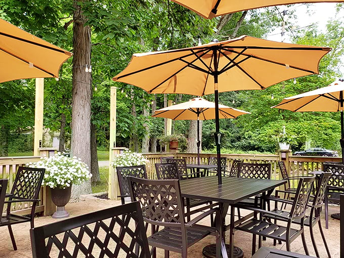 Outdoor seating nestled among the trees offers a peaceful retreat. Nature provides the perfect backdrop for summer dining adventures.