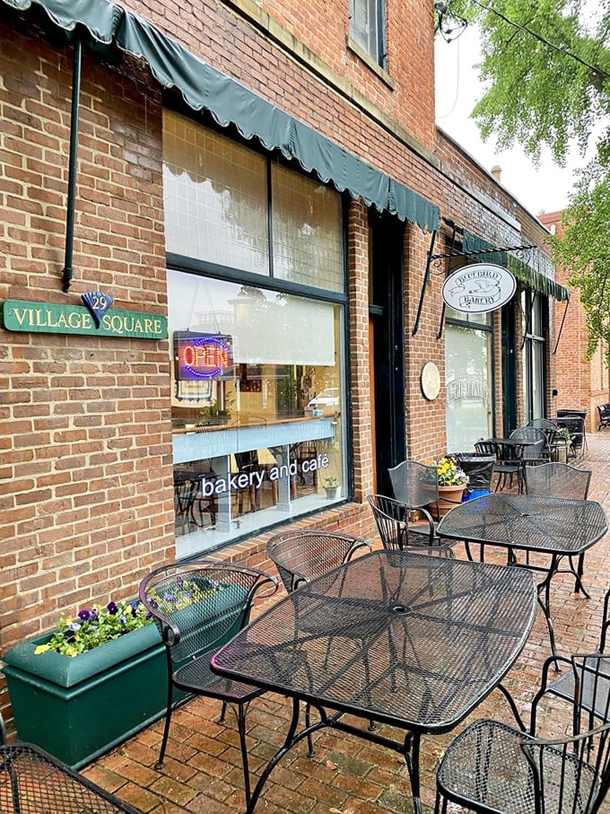 Outdoor seating that transforms a simple coffee break into a European-style café experience, complete with flower boxes that say "we care about details."