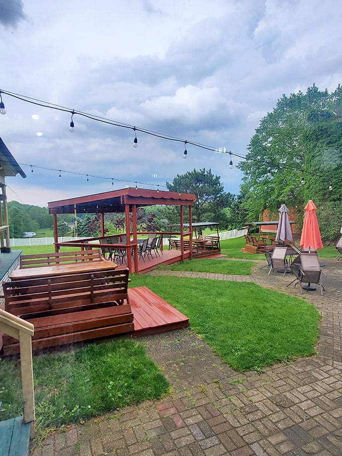 Al fresco dining done right. String lights, fresh air, and comfortable seating—the perfect setting for summer evening feasts.