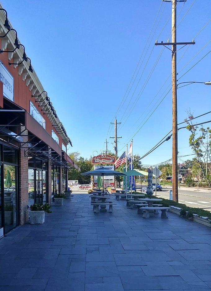 Picnic tables awaiting weary shoppers—the perfect pit stop to rest your feet and strategize your next bargain battlefield approach.