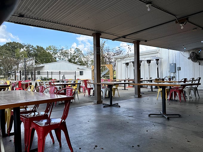 The outdoor seating area offers a breezy alternative for enjoying your seafood feast, with colorful chairs as vibrant as the food.