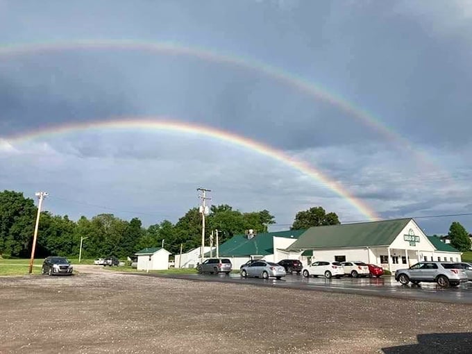 Even Mother Nature approves—a double rainbow blessing the café after a summer shower. Some might call it divine endorsement.