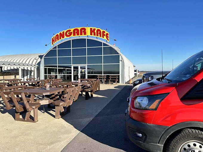 Blue skies and open spaces surround the distinctive curved hangar—a destination worth the drive through Missouri farmland.