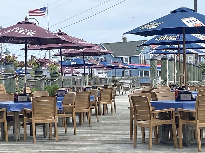 Blue umbrellas, blue water, and blue skies—the perfect trinity of waterfront dining. JP's outdoor seating area invites you to linger over lunch and life's pleasures.