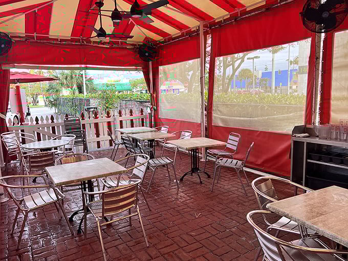 Even the outdoor seating keeps the carnival vibe alive. Red and white stripes aren't just a theme—they're Jaxson's love language.