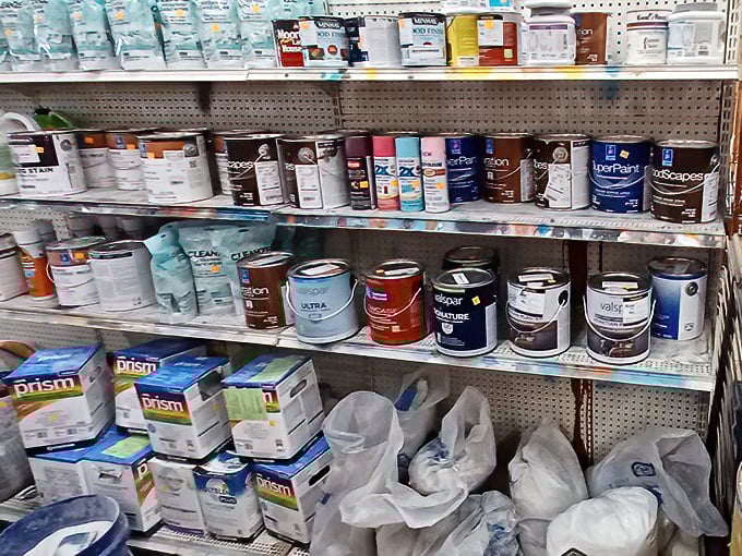 The paint section—a rainbow of possibilities where someone else's "not quite right" becomes your "absolutely perfect" at a fraction of the cost.