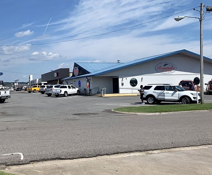 On busy days, the parking lot becomes a license plate collection from across Arkansas—concrete proof that great food creates its own gravity.
