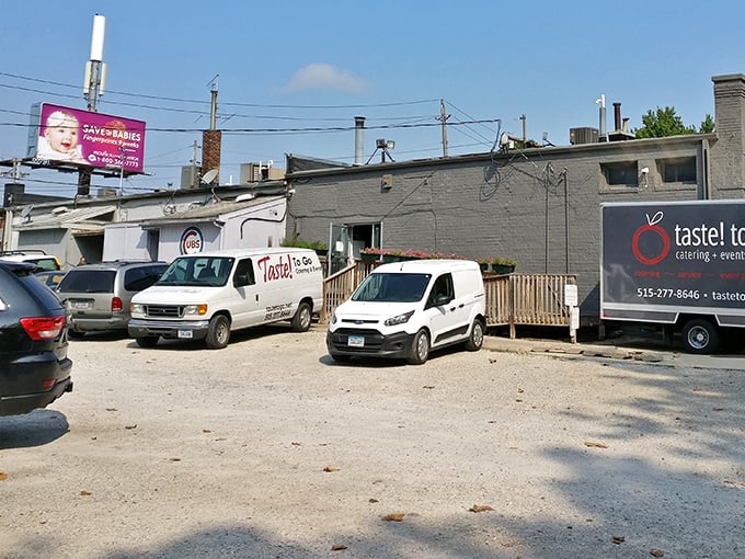 The back parking lot—where hungry patrons' vehicles gather like faithful pilgrims at the shrine of perfect breakfast. Worth the journey every time.