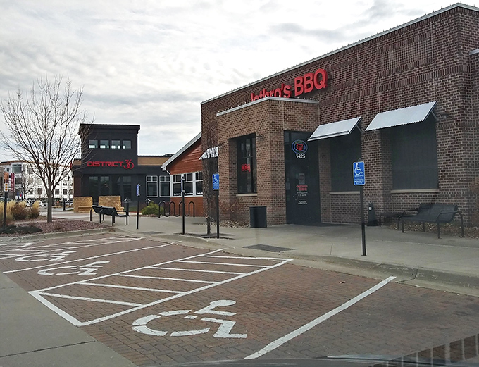 The brick exterior and convenient parking say "we're serious about accessibility"—because great barbecue shouldn't require an expedition.
