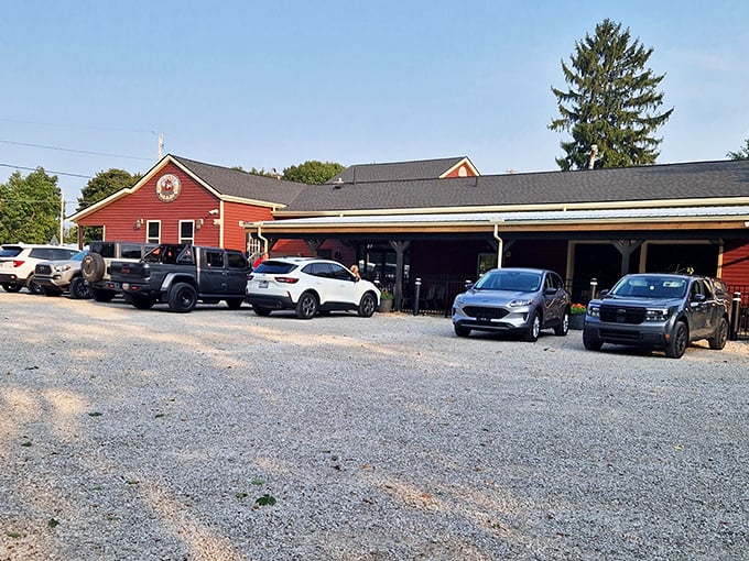 The packed gravel parking lot tells the real story—this is where locals choose to spend their hard-earned dollars and precious free time.