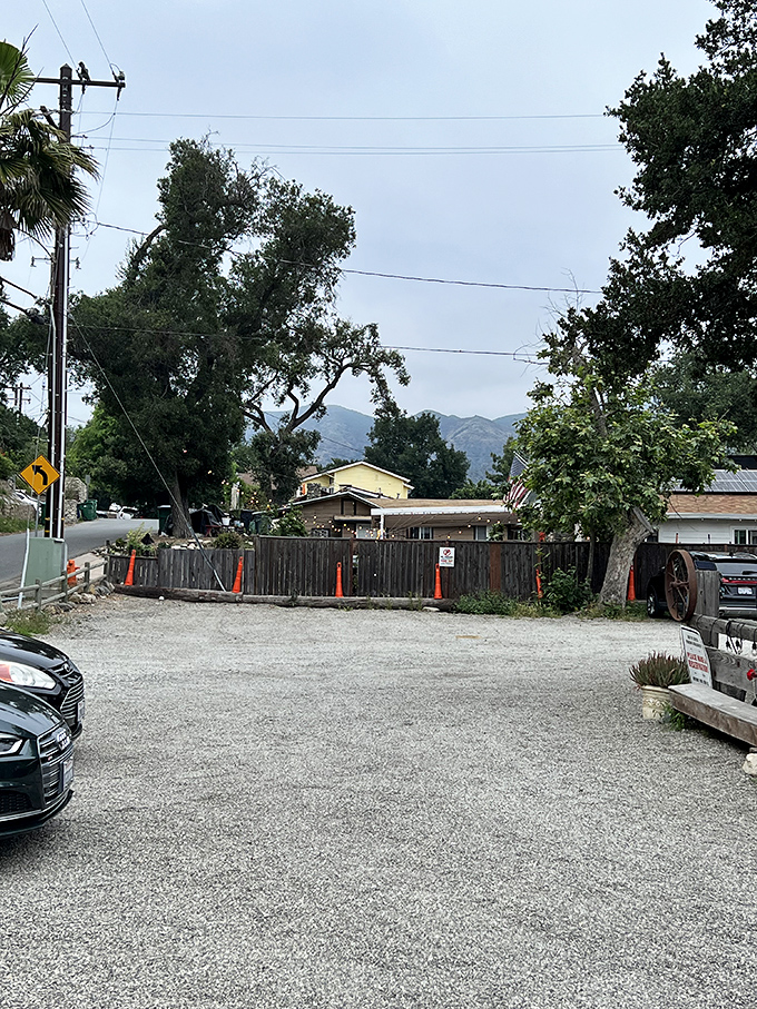 The gravel parking lot – where California's fanciest cars park alongside pickup trucks, united by their drivers' excellent taste in steak.