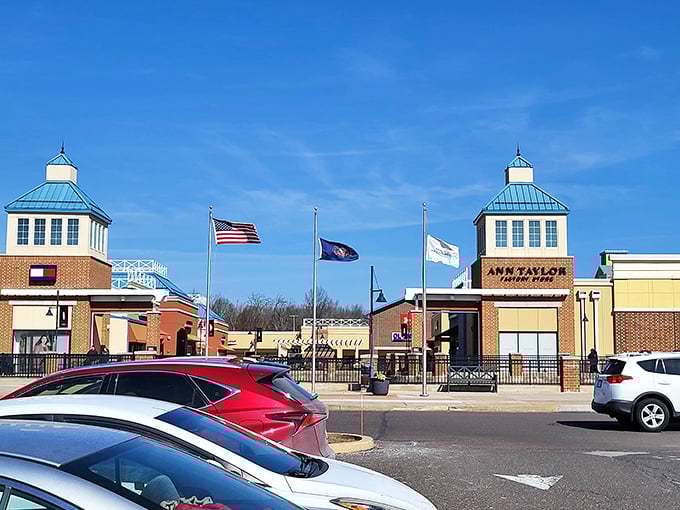 Twin towers and American flags welcome shoppers to this retail promised land. Ann Taylor Factory Store awaits those seeking workwear that works for their budget.