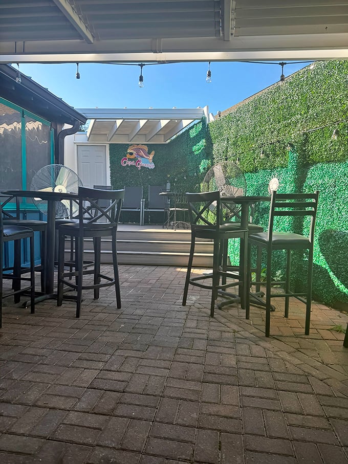 The patio offers a breath of fresh air and greenery – the perfect backdrop for savoring those famous crab cakes on a perfect Virginia day.