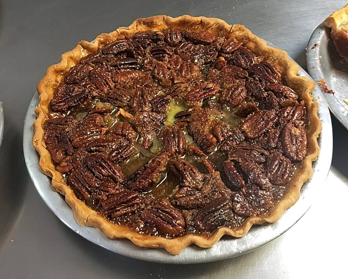 This pecan pie isn't just dessert—it's an architectural marvel of nuts, filling, and crust that would make Frank Lloyd Wright put down his blueprints and pick up a fork.