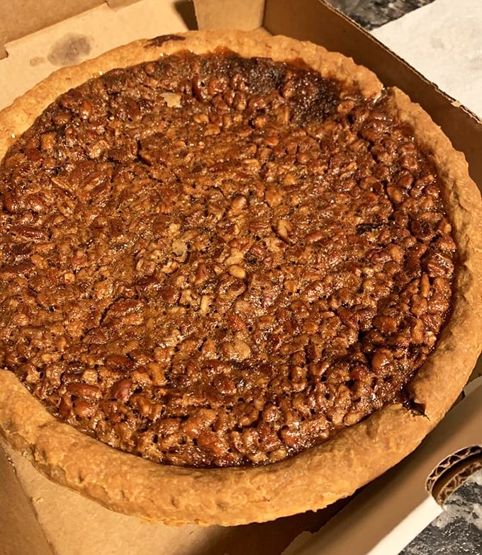 Pecan pie that's achieved the perfect balance between gooey filling and crunchy nuts—a textural masterpiece in a humble crust.