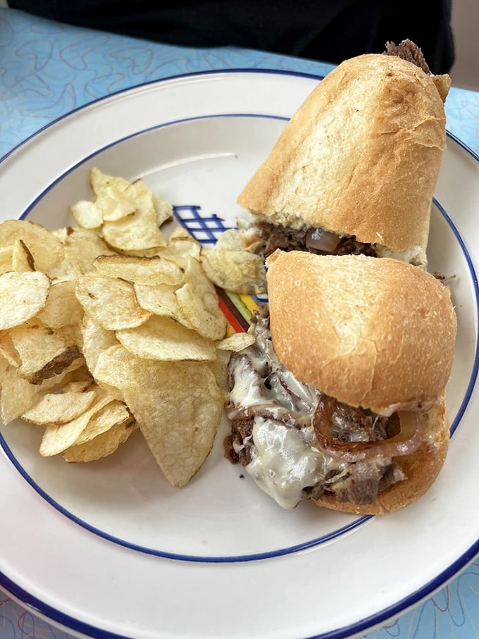 This Philly cheesesteak doesn't need Philadelphia's approval—it's confident in its melty, meaty glory. The chips are just showing off.