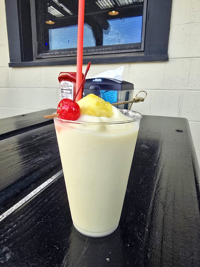 This piña colada isn't just a drink—it's a vacation in a glass, complete with the little paper umbrella of happiness.