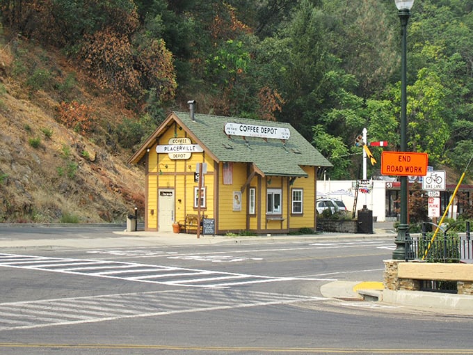 The sunny yellow Coffee Depot stands like a caffeinated beacon of hope. This former train station now fuels locals with espresso instead of steam.