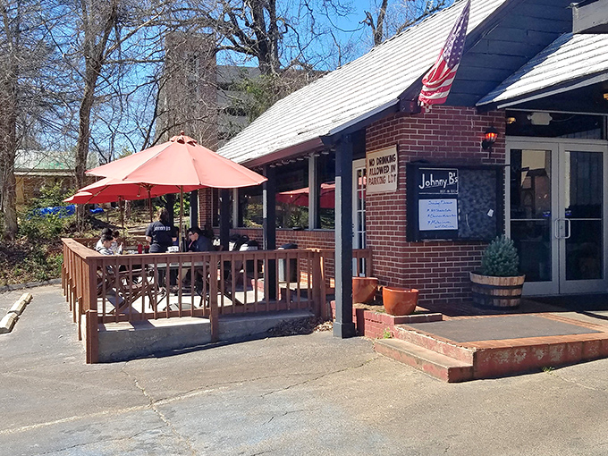 Outdoor seating where Dahlonega's mountain air seasons every bite. The porch—where food tastes better and conversations flow easier.