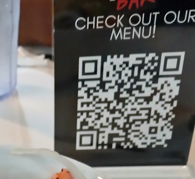 Modern dining meets tech-savvy convenience with QR code menus—because sometimes the fastest path to good food is through your smartphone.