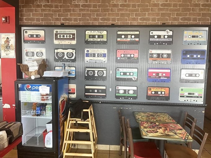 That cassette tape wall isn't just retro—it's a reminder that like great music, great burger joints never go out of style.