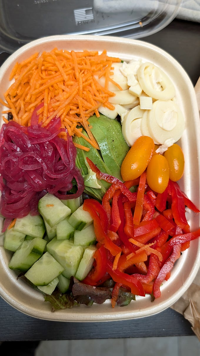 This vibrant salad bowl proves Deli Board isn't just about meat between bread—it's a colorful testament to California's produce prowess and balanced eating.