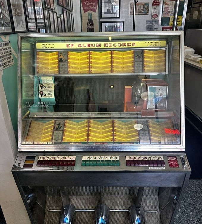 The jukebox isn't retro; it's a survivor – a musical time machine where three nickels still buy you a soundtrack for your banana split experience.
