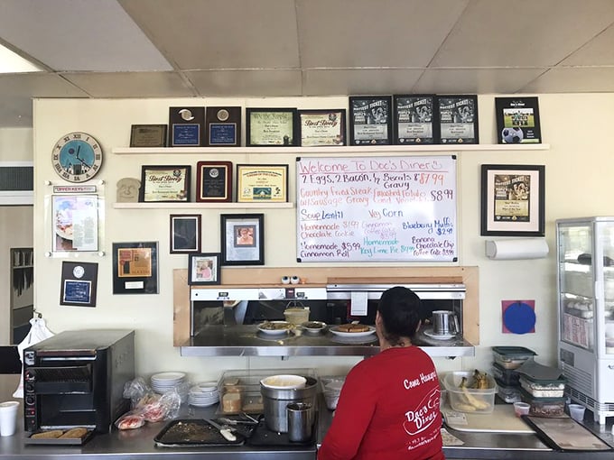 Awards and accolades line the wall behind the service window—silent testimonials to years of breakfast perfection.