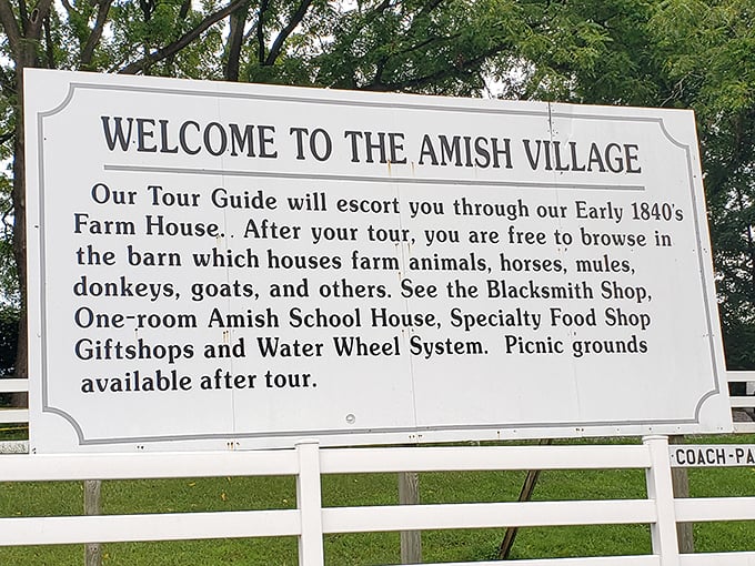 This informative sign outlines the complete Amish Village experience—from farmhouse to animals to blacksmith shop—no smartphone app required.