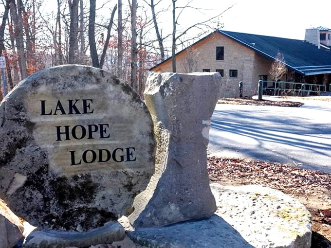 The stone marker stands sentinel at the entrance, like a culinary milestone announcing "Your taste buds' journey begins here."