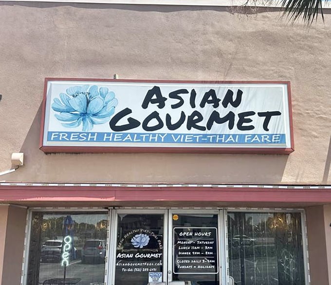 The sign promises "Fresh Healthy Viet-Thai Fare" – a promise the kitchen keeps with every plate that emerges.