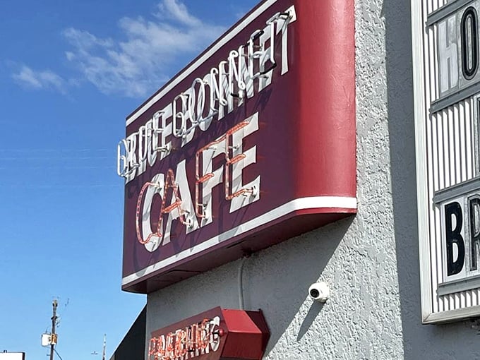 That vintage sign doesn't need neon or flashing lights to announce greatness. Like a confident Texan, it simply states its name and lets reputation do the rest.