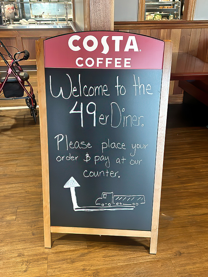 "Welcome to the 49er Diner" – six words that promise good things ahead. The chalkboard simplicity perfectly matches the unpretentious vibe.