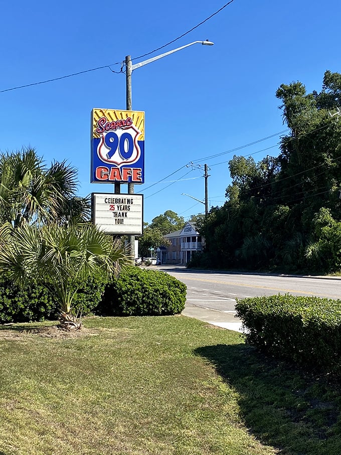 The sign doesn't just mark a location—it celebrates a quarter-century of feeding Pensacola with zero pretension and maximum flavor.